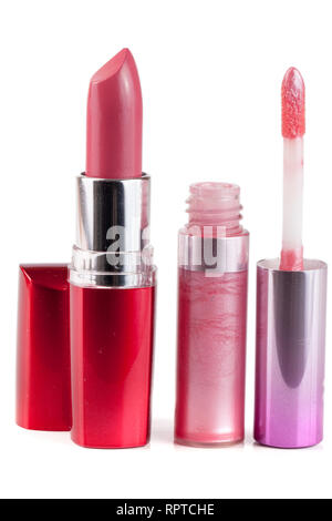 attractive girl in red shiny dress hiding joker card in dress isolated ...