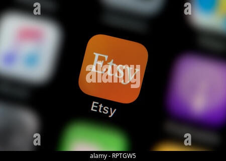 A close-up shot of the Etsy app icon, as seen on the screen of a smart ...