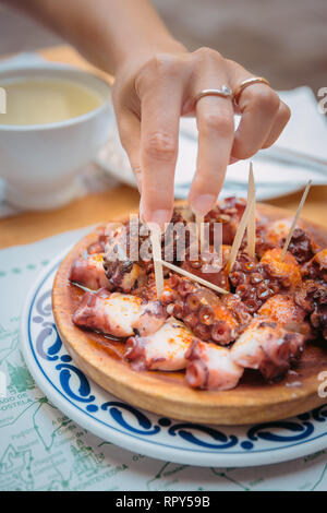 Galician-style octopus dish with paprika and olive oil. Typical Spanish ...