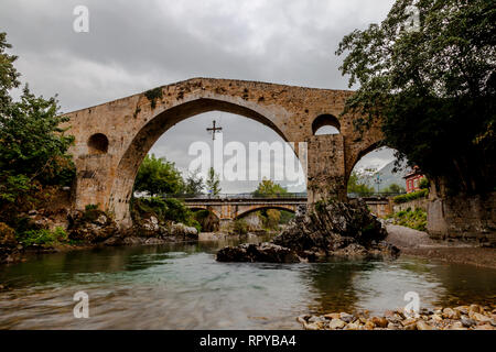 Spain, Asturias: Romanesque stone bridge over mountain river Cares in ...