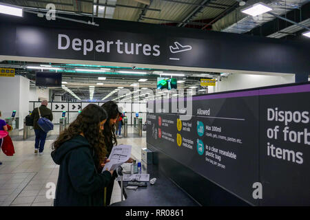 Getting ready for security checks, Luton Airport, Luton, London ...