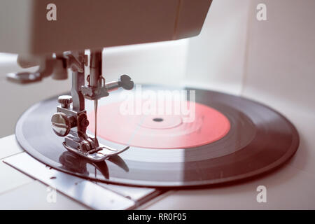 Vinyl on sewing machine. How to use old stuff concept. Wrong way of ...