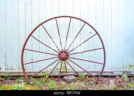 old rusty metal wheel with spokes for work in agriculture Stock Photo ...