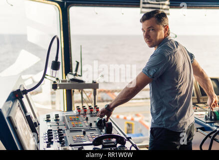 Marine navigational officer during navigational watch on Bridge Stock ...