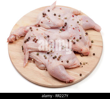 raw chicken carcass on the cutting board isolated on white background ...