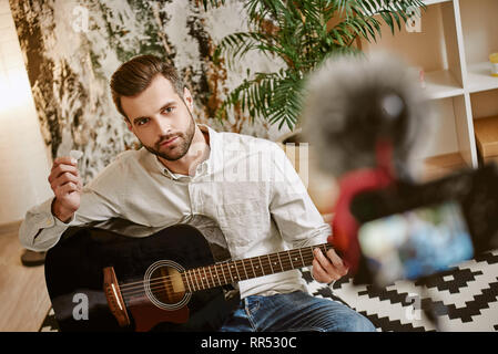 close-up of a guitarist learning to play guitar Stock Photo - Alamy
