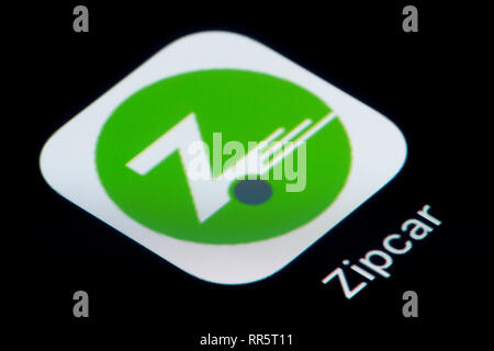 A close-up shot of the Zipcar app icon, as seen on the screen of a ...