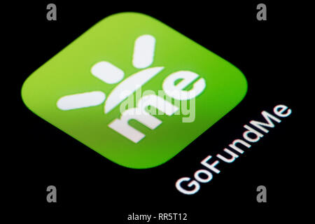 A close-up shot of the GoFundMe app icon, as seen on the screen of a ...