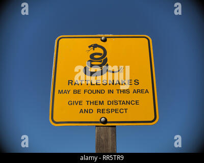 Rattlesnakes May Be Found in This Area Sign Stock Photo - Alamy