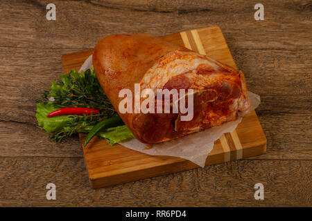 Raw pork knuckle marinated for cooking Stock Photo - Alamy