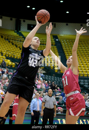 William & Mary guard/forward Bailey Eichner (21) draws a charge on ...