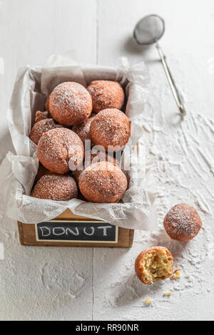 Sweet and fresh mini doughnuts ready to eat Stock Photo - Alamy