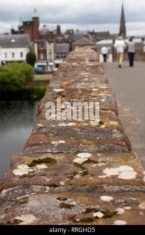 View of the historic Devorgilla Bridge over the River Nith in Dumfries ...