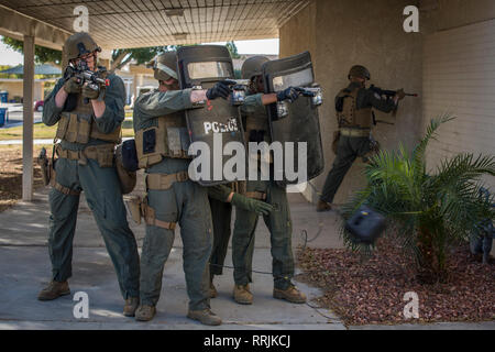 Special Reaction Team Marines and police officers with the Provost ...