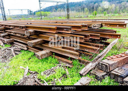 Demounted disassembled old unused railroad tracks and sleepers ...