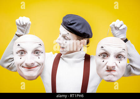 Masks with different emotions of pantomime on the black background ...