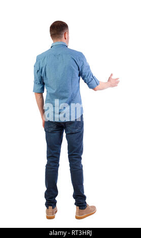 Back view of a man who stretches his hand for a handshake. Rear view ...