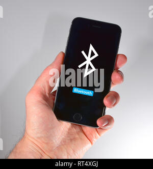 Share, hands and phone with screen for files, transfer or networking on ...