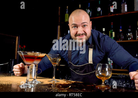 Stressed man drinks alcohol at the counter in bar Stock Photo - Alamy