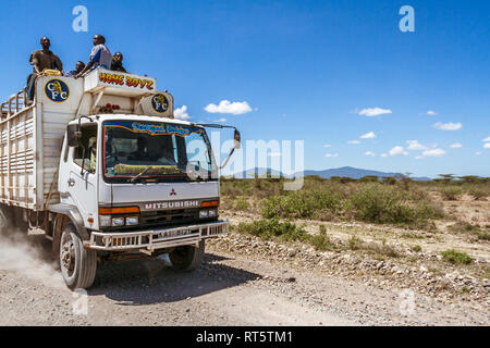 Nanyuki, Kenya, May 18, 2017 : People traveling on a stony track in a ...