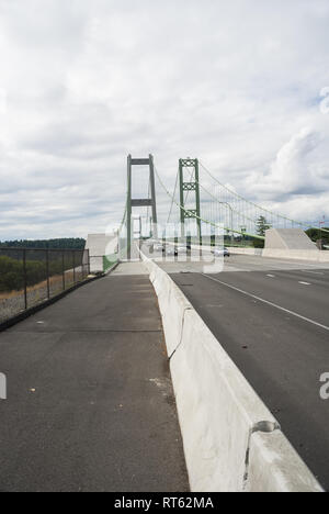 A view of the Tacoma Narrows Bridges from the water surface. The ...
