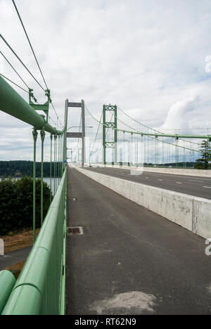 A view of the Tacoma Narrows Bridges from the water surface. The ...