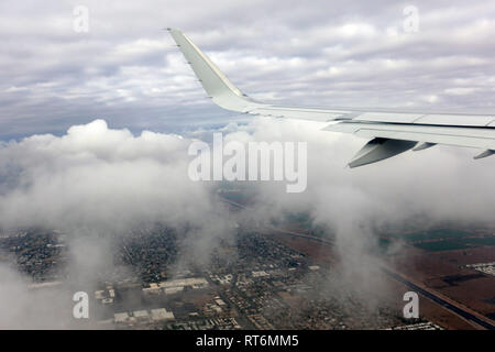 A view from 10,000 feet looking out the window of an airplane Stock ...