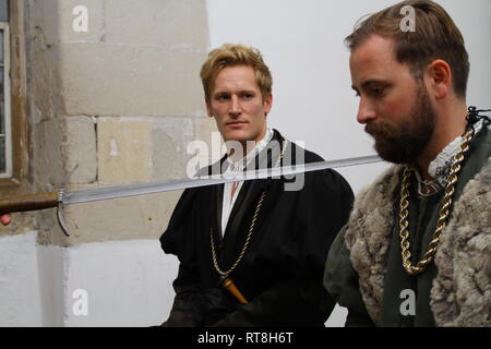 Two knight figures with sword on the wall of the Ancienna Dovane ...