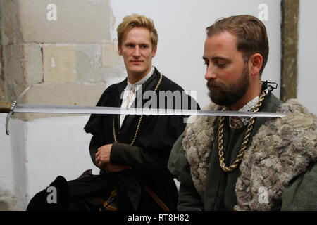 Two knight figures with sword on the wall of the Ancienna Dovane ...