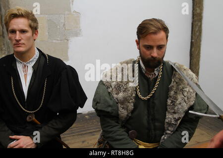 Two knight figures with sword on the wall of the Ancienna Dovane ...