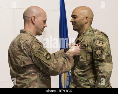 Maj. Shane Patty, outgoing commanding of the 407th Expeditionary Civil ...