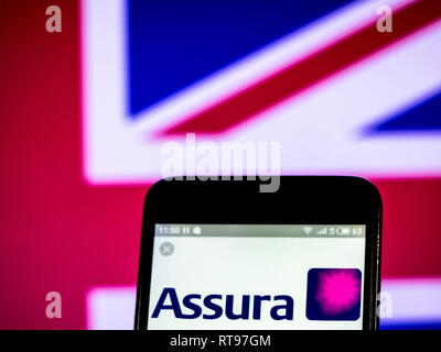 Assura plc logo seen displayed on smart phone Stock Photo - Alamy