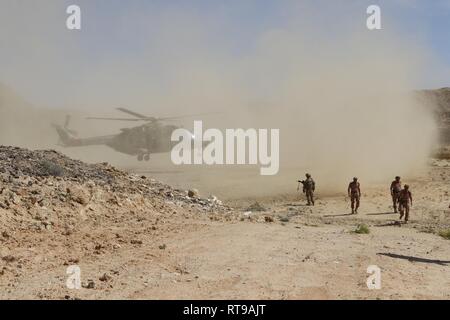 A Royal Air Force of Oman NH-90 helicopter takes a hard right to ...