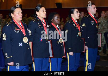 A ceremony inducts new noncommissioned officers into the U.S. Army NCO ...