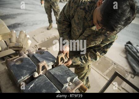 A U.S. Marine Corps tank crewman with Company B, 2nd Tank Battalion ...