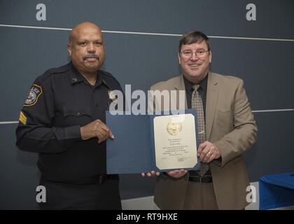 Naval Support Activity Bethesda police officer Corporal Albert Reid ...