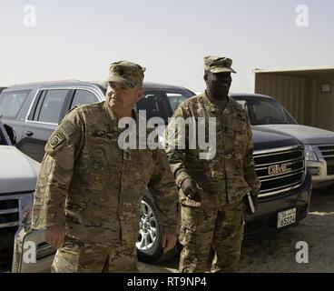 Command Sgt. Maj. Roderick Upton, 300th Sustainment Brigade, receives a ...