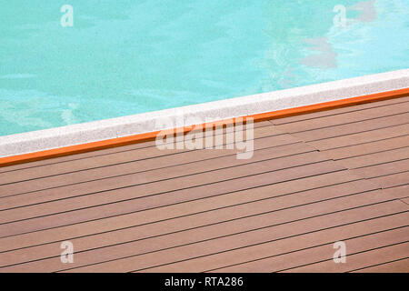Brown wood plank boards around swimming pool Stock Photo - Alamy