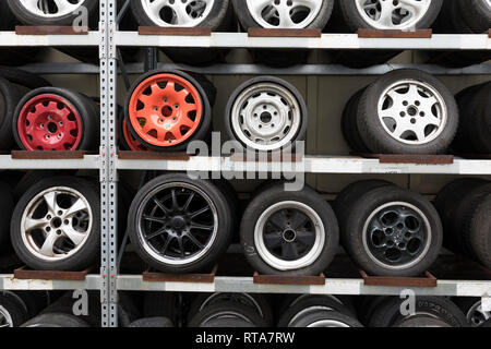 Collection of second hand wheels and tires for sale Stock Photo - Alamy