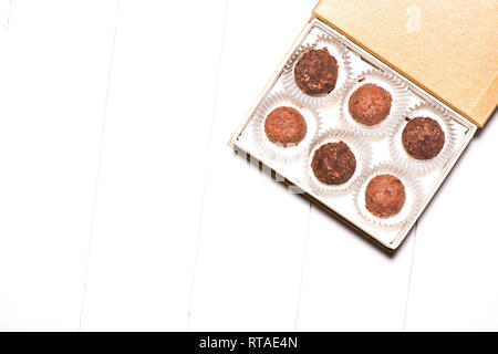 Closeup view of box of chocolates with variety chocolates pralines ...