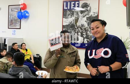CAMP HUMPHREYS, Republic of Korea - Staff Sgt. Eric A. Felli (center ...