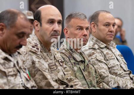 U.S. Brig. Gen. Michael Wickman, left, deputy commanding general for ...