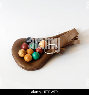 Old toy marbles in leather bag Stock Photo - Alamy