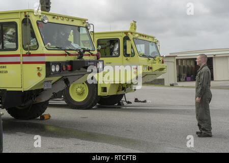 Two crash fire rescue Marines fight an extremely hot jet fuel fire to ...