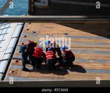 SASEBO, Japan (Feb. 14, 2019) Sailors aboard Landing Craft, Utility ...