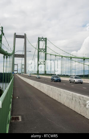 A view of the Tacoma Narrows Bridges from the water surface. The ...