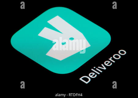 The website of Deliveroo is seen on an iPad tablet, which is resting on ...