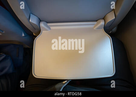 Passengers view of fold down seating table tray on a british railway ...