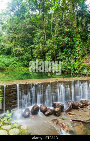 landscape of beautiful Artificial waterfall in garden at the public ...