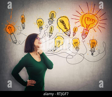 hand holding light bulb over blue background, panoramic layout Stock ...